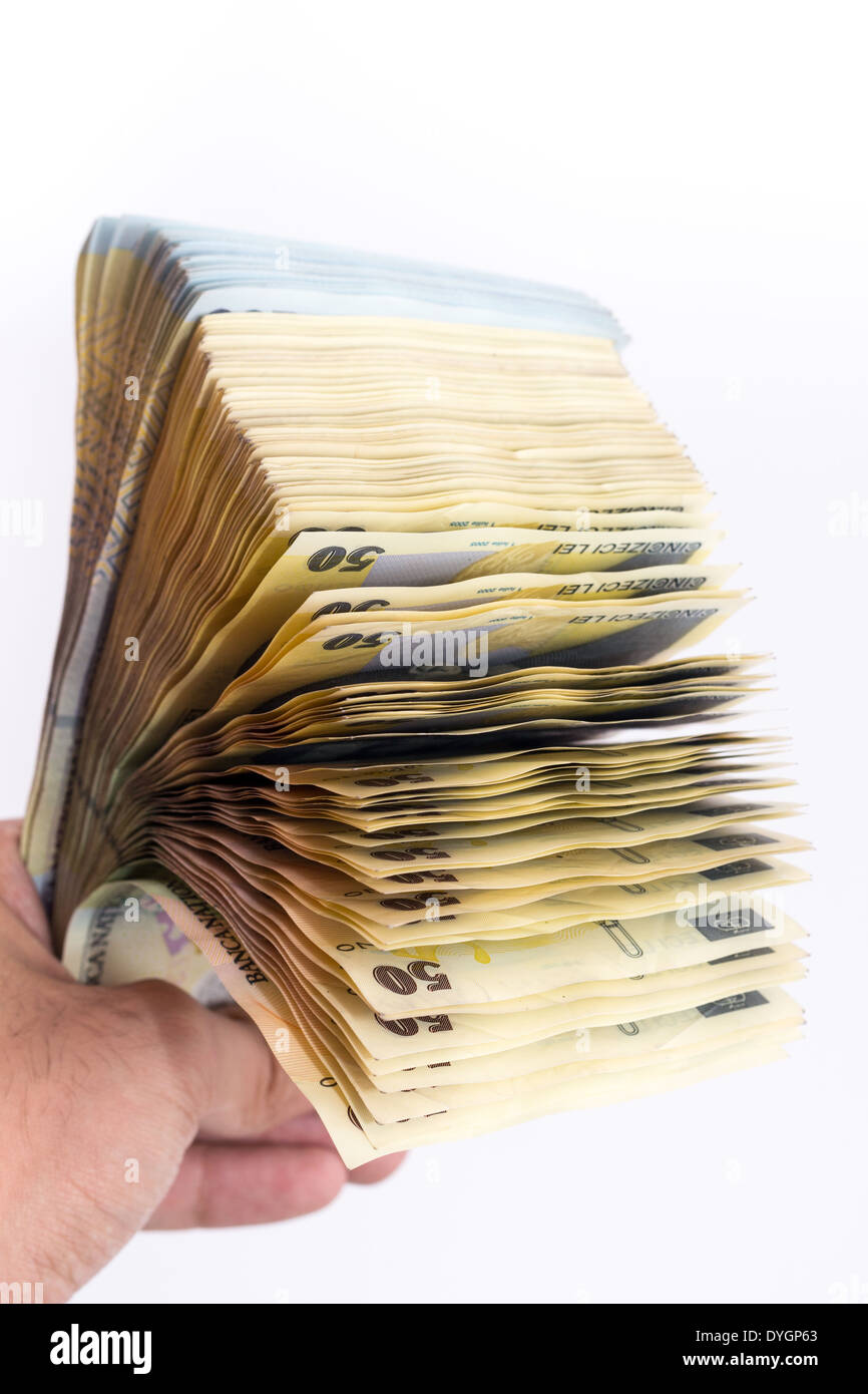 Stack of Romanian Lei held in the hand Stock Photo - Alamy
