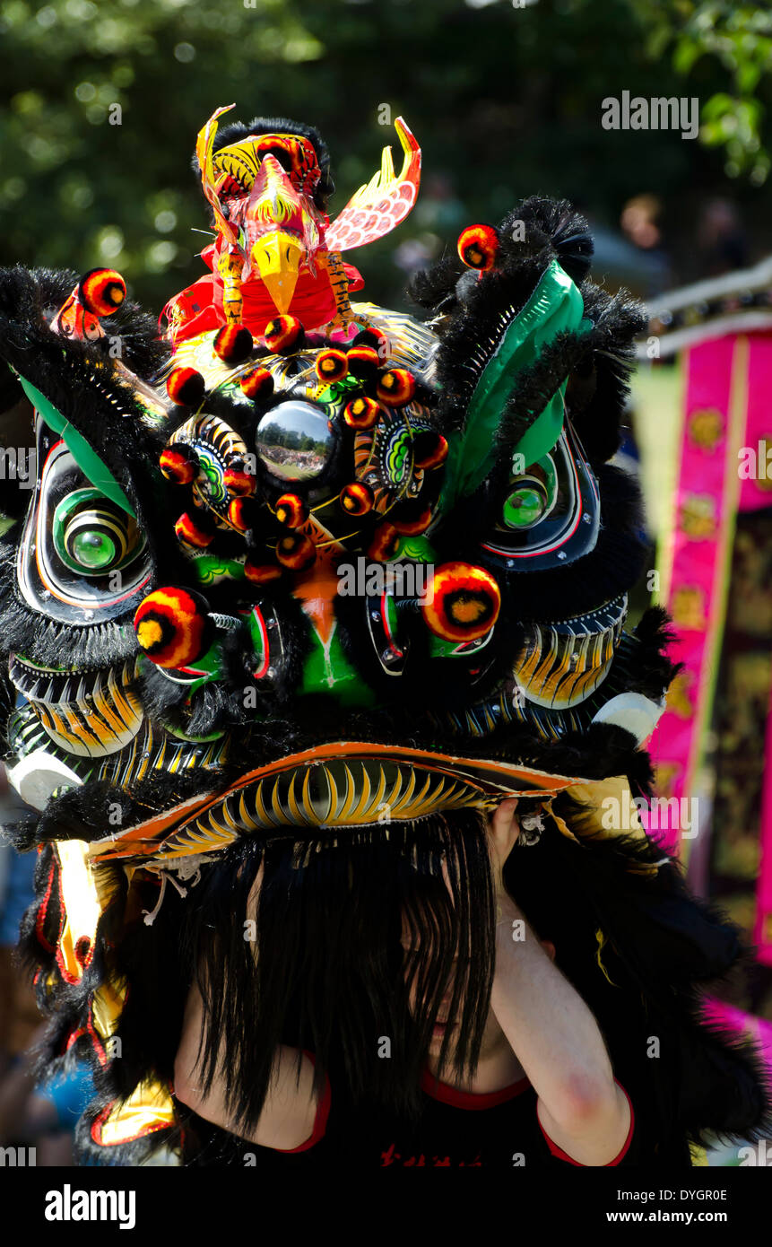 Chinese dragon dancer performing at the Carnival, part of the Edinburgh ...