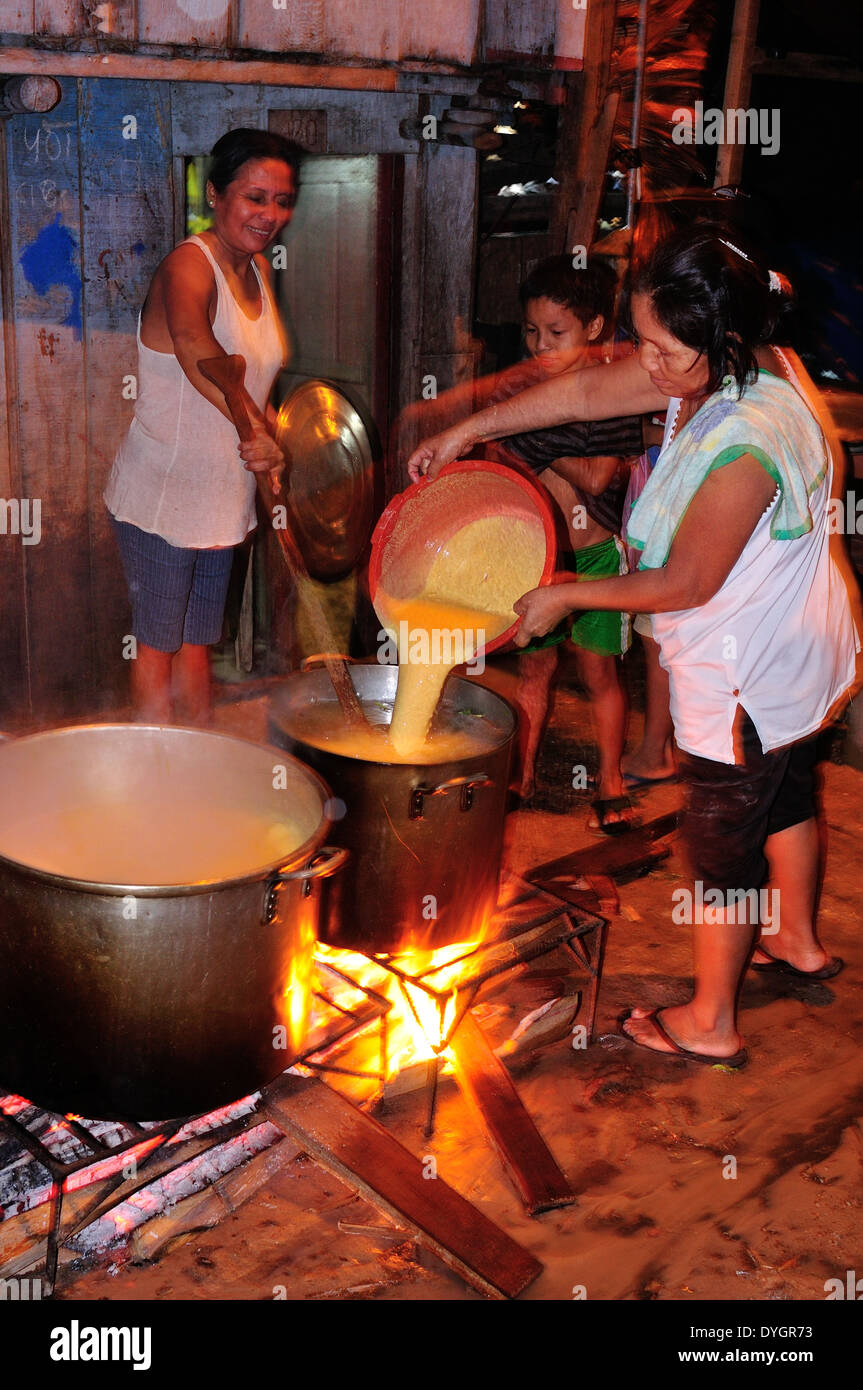 Elaboration of Chicha by traditional method for Fiesta de San Juan in ...