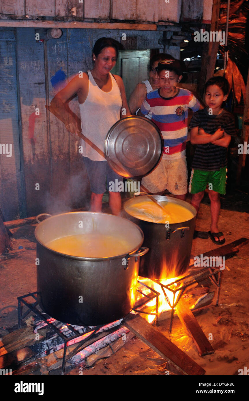 Elaboration of Chicha by traditional method for Fiesta de San Juan in ...