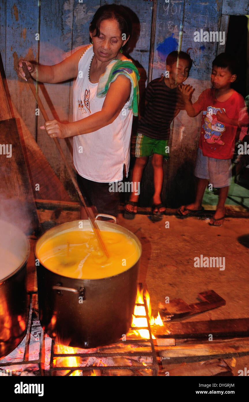 Elaboration of Chicha by traditional method for Fiesta de San Juan in ...
