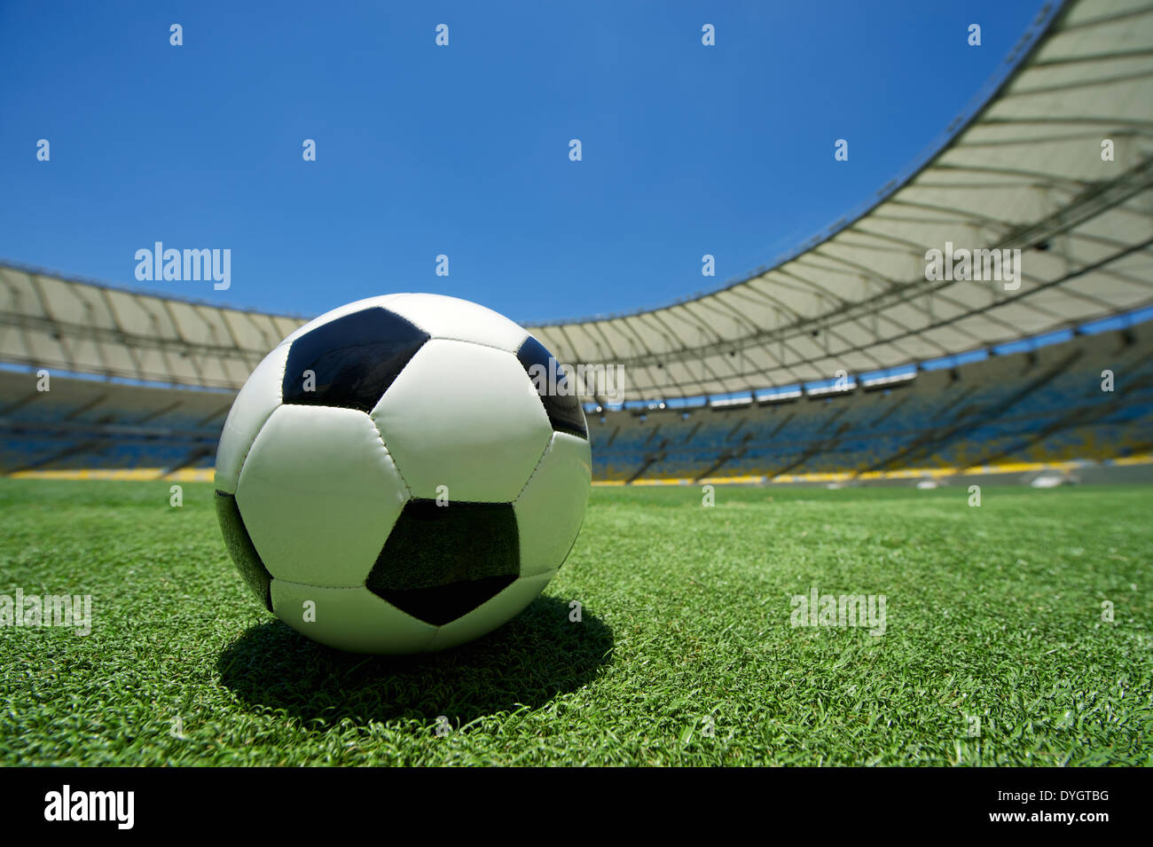 Soccer ball in the stadium hi-res stock photography and images - Alamy