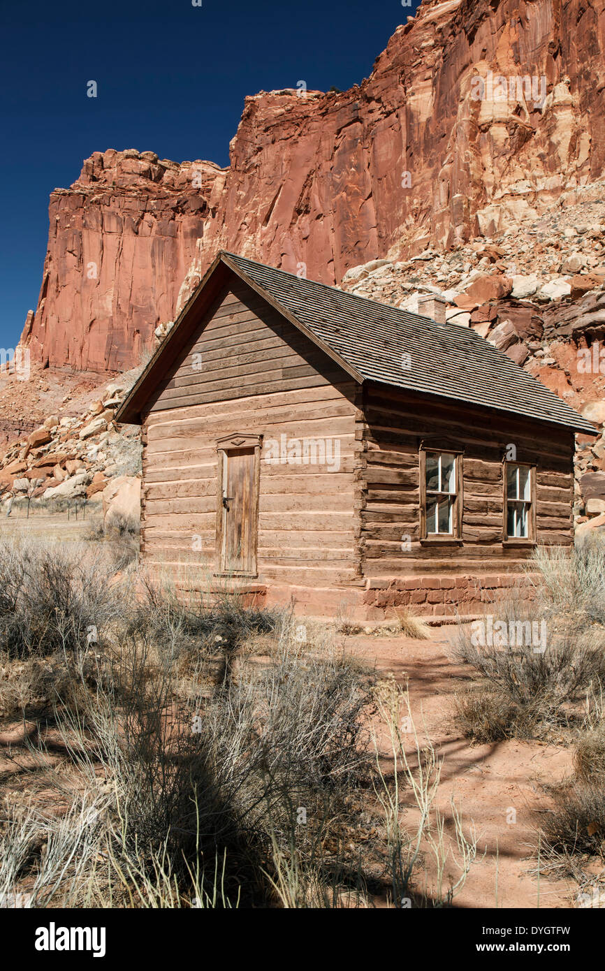 Schoolhouse and sandstone bluff, historic Fruita, Capitol Reef National ...