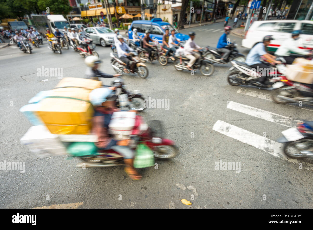 Motion view of street in Vietnam. Southeast Asia. Busy daily traffic ...