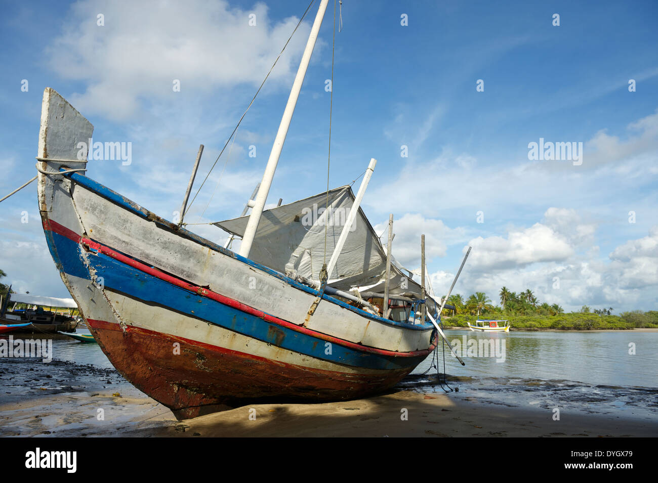 Colorful traditional fishing boat on the shore of river in Northeast ...
