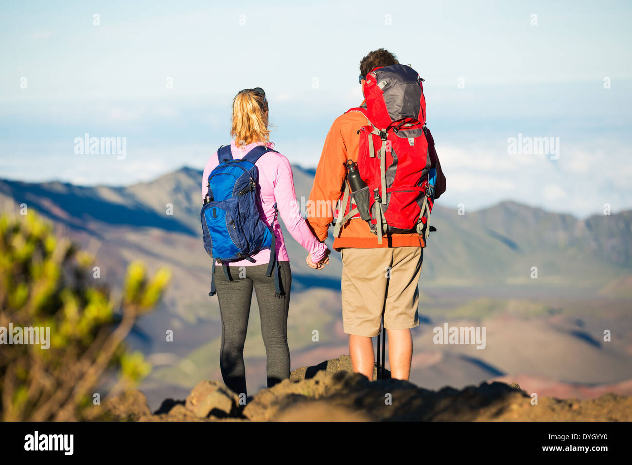 Girl looking out from mountain top hi-res stock photography and images ...