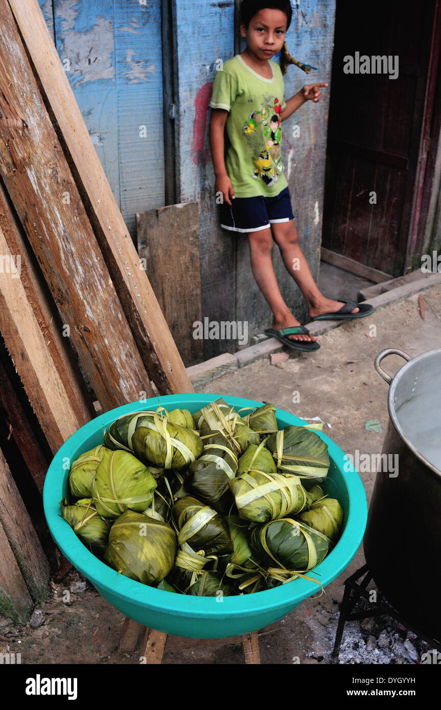 Cooking Juanes by traditional method for Fiesta de San Juan - Morona ...