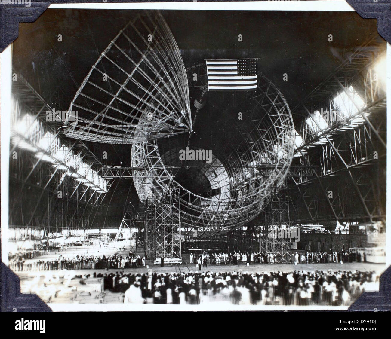 This image captures the Goodyear Blimp alongside the USS Akron, one of ...