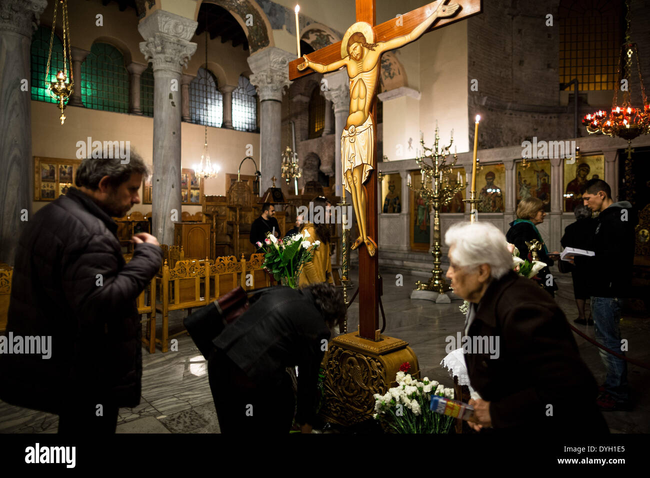 Thessaloniki, Greece . 17th Apr, 2014. Worshipers pay homage to a ...