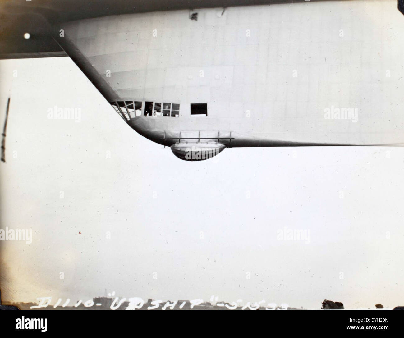 This image captures a historical moment involving the USS Akron (ZRS-4 ...