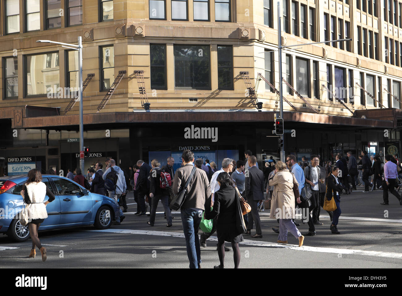 pedestrians crossing busy junction on elizabeth road in sydney city ...