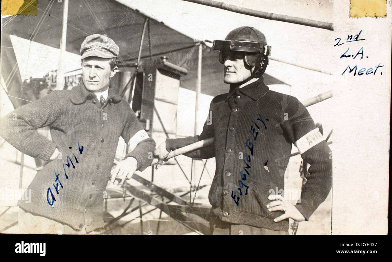 This image features a barnstormer aircraft from the early 20th century ...