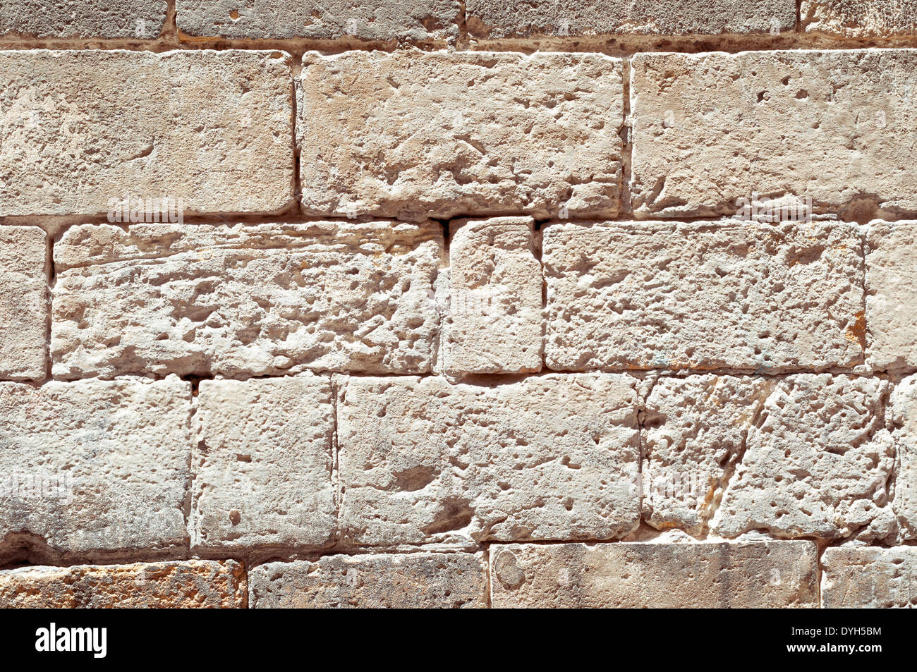 ancient sand brick wall background from Barcelona, Spain Stock Photo ...