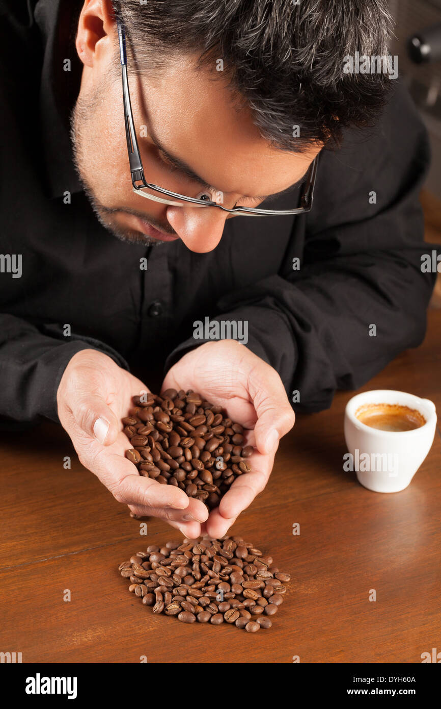 Coffee Sommelier Examining Roasted Bean Stock Photo - Alamy