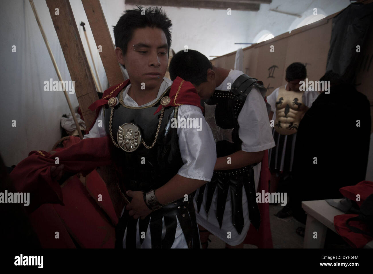 Puebla, Mexico. 17th Apr, 2014. A resident depicting a Roman soldier ...