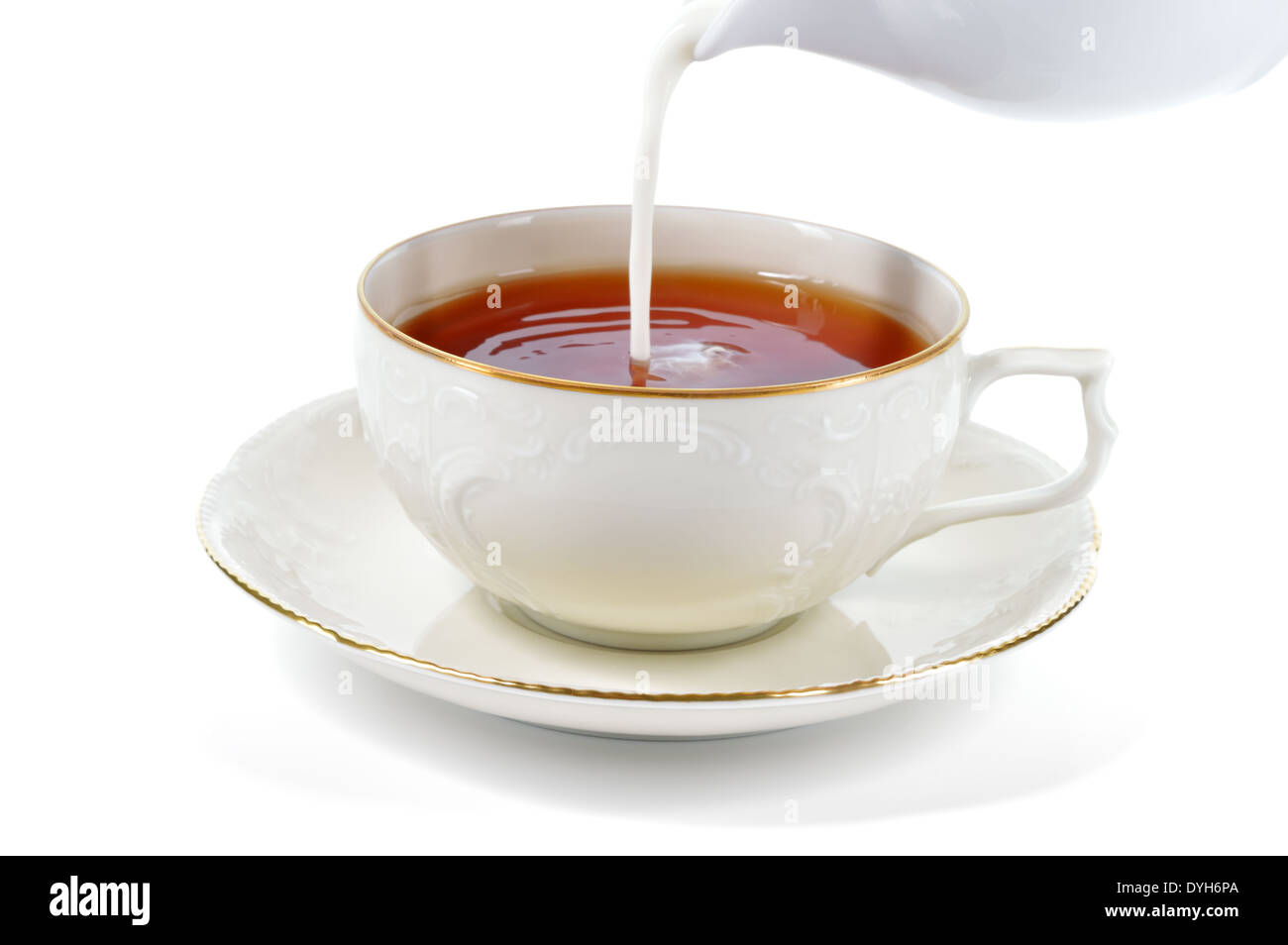 Serving cup of tea with milk isolated on white background. Porcelain ...