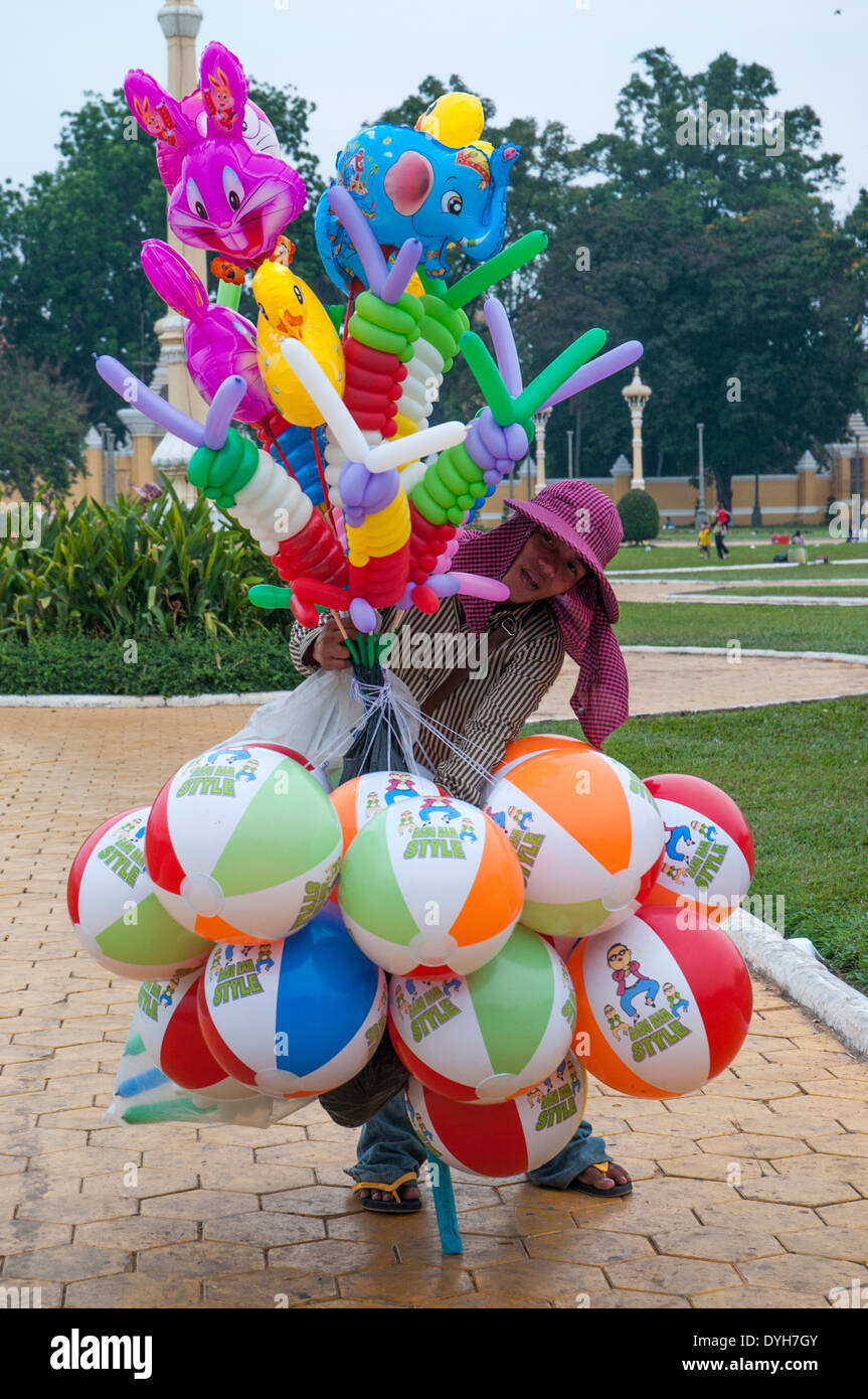 Balloon vendor at a park outside the Royal Palace, Phnom Penh, Cambodia ...