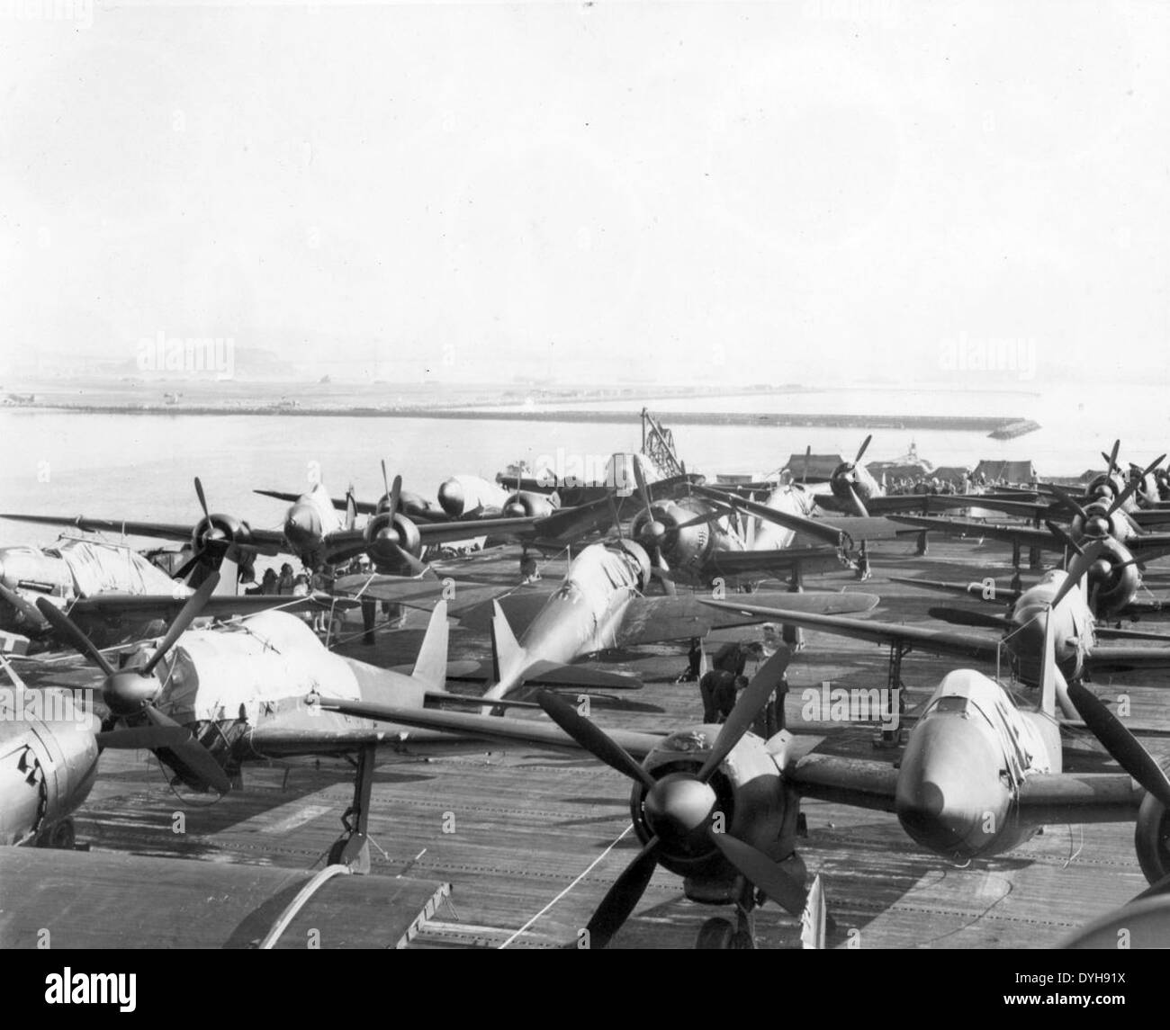 This image features a collection of captured Japanese aircraft from ...