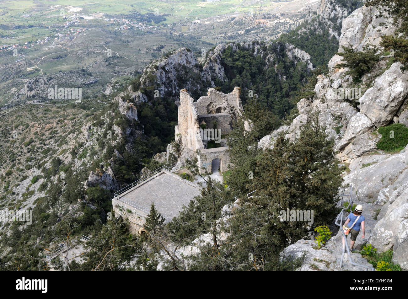 Tourist walking on the Buffavento Castle steps Five Finger Mountain ...