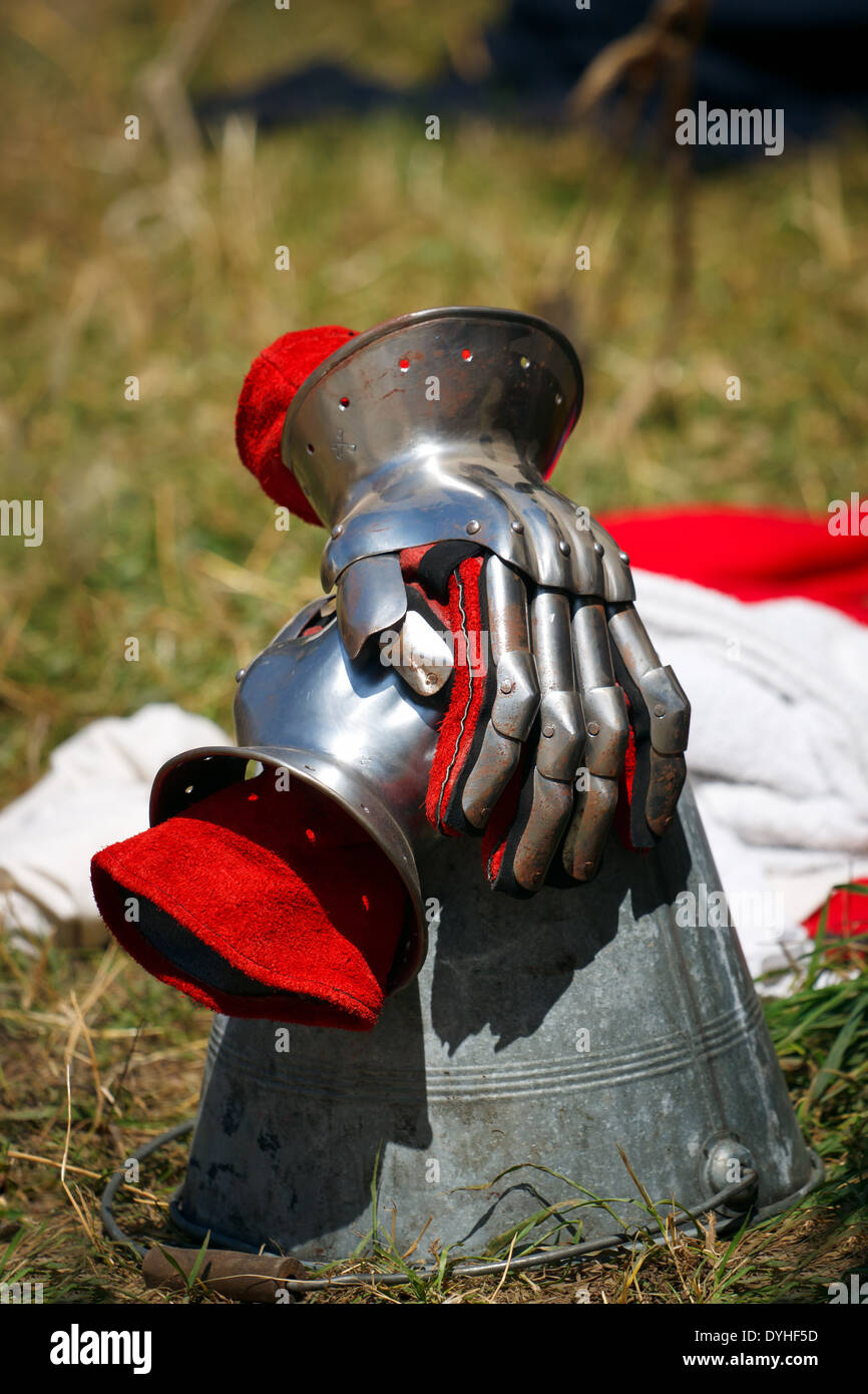 Knights gloves, steel and red leather Stock Photo - Alamy