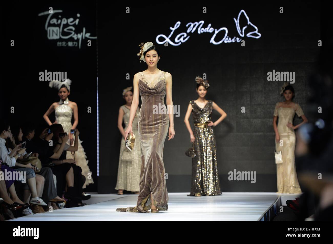 Taipei. 18th Apr, 2014. Models present creations during the fashion ...