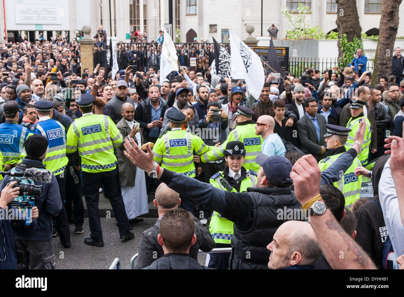 London, April 18th 2014. The EDL in the foreground and other British ...