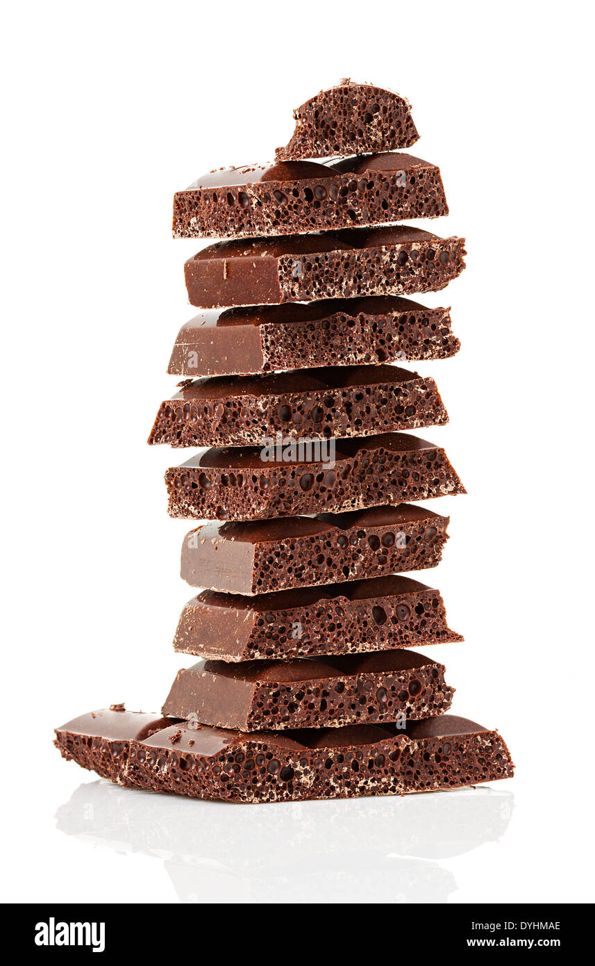 Closeup detail of chocolate parts on white background Stock Photo - Alamy
