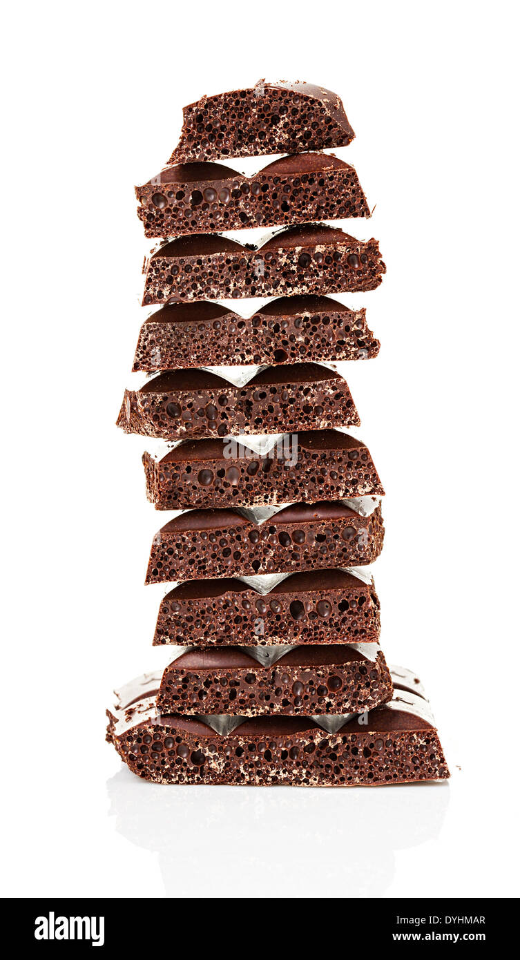Closeup detail of chocolate parts on white background Stock Photo - Alamy