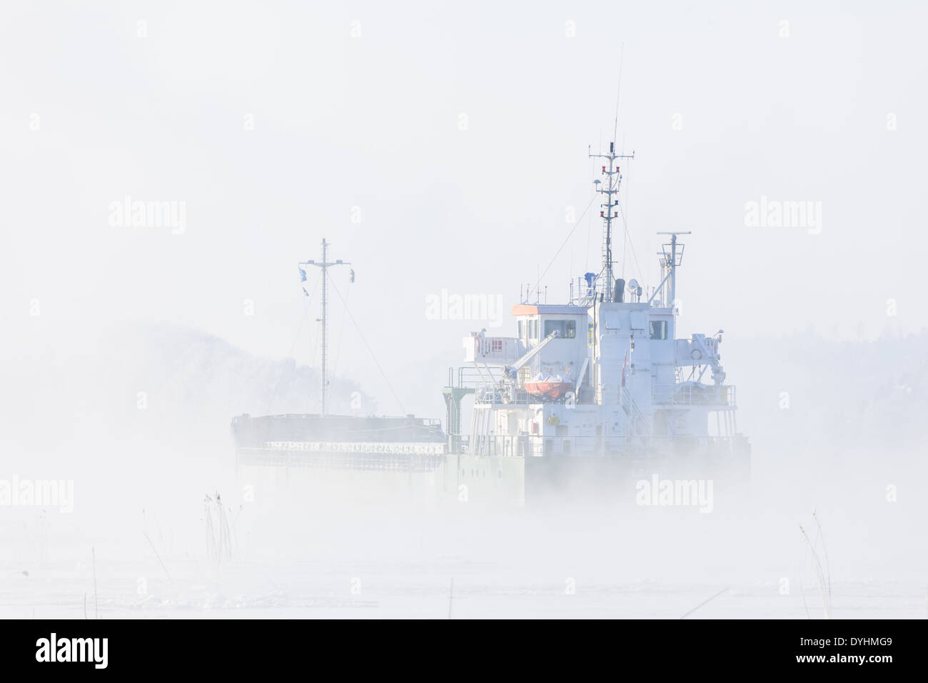 Freight boat in mist. Göta Älv, Sweden, Europe Stock Photo - Alamy