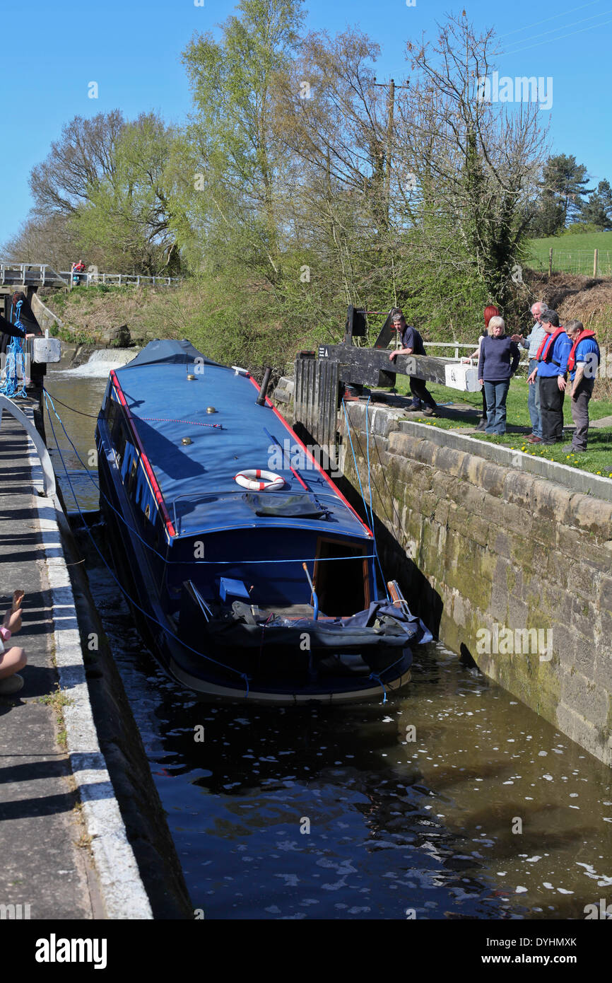 Chorley, Lancashire, Uk. 18th March 2014. Canal Barge grounded on lock ...