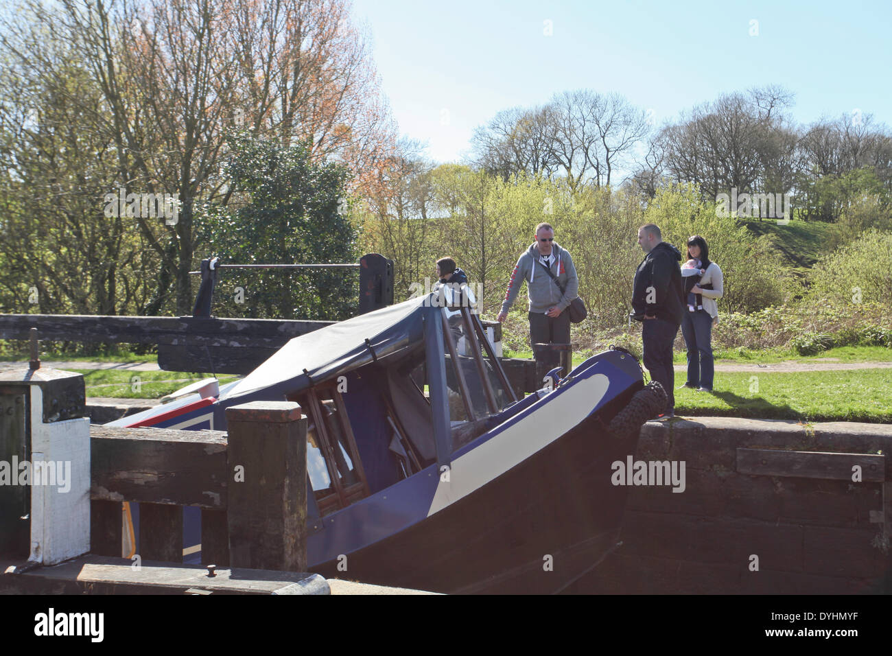 Chorley, Lancashire, Uk. 18th March 2014. Canal Barge grounded on lock ...