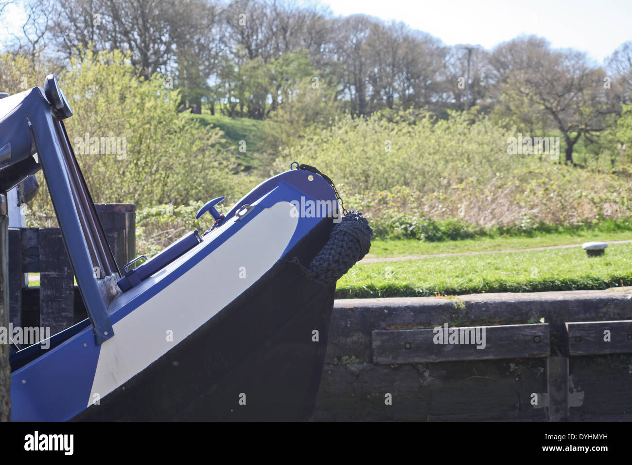 Chorley, Lancashire, Uk. 18th March 2014. Canal Barge grounded on lock ...