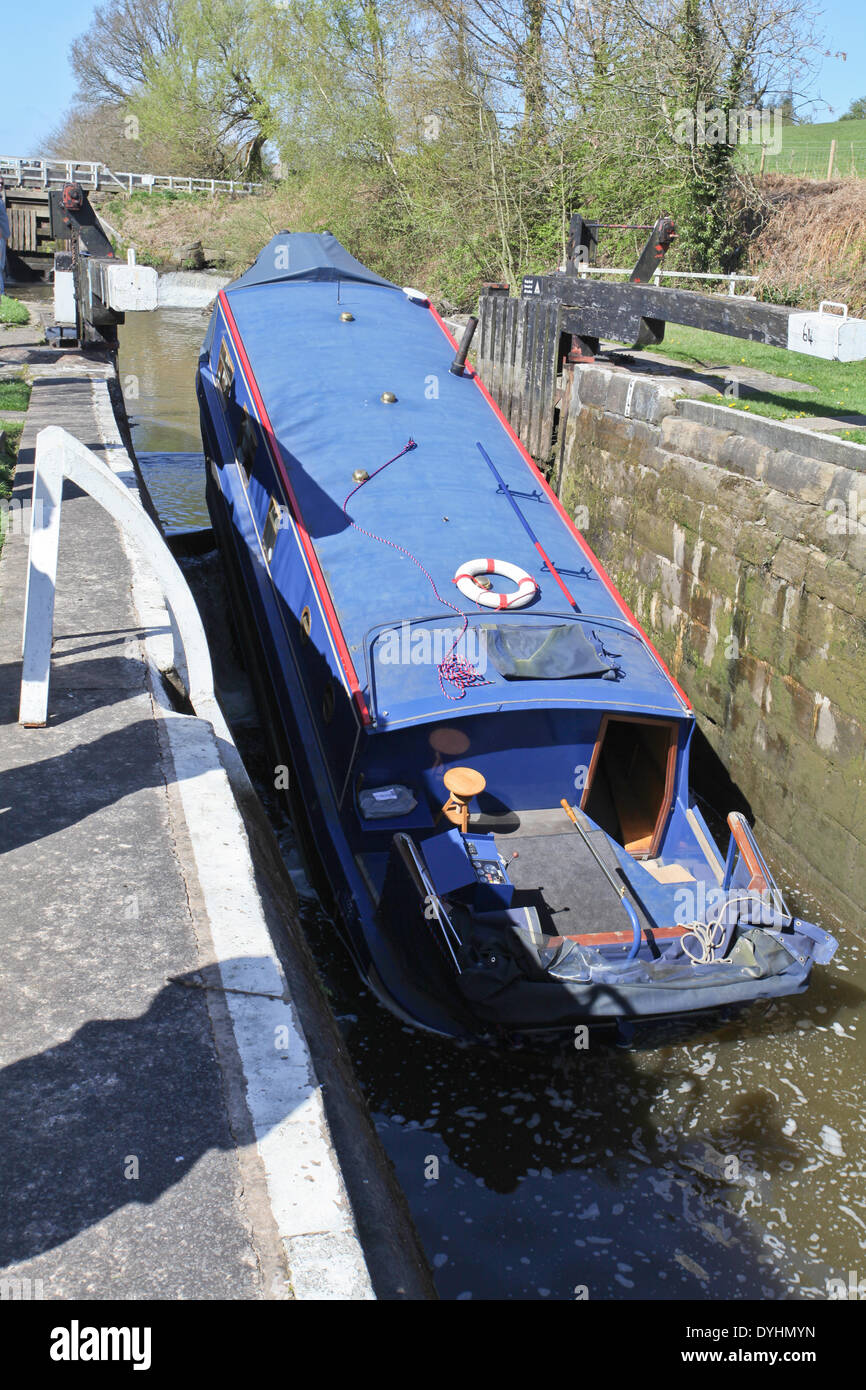 Chorley, Lancashire, Uk. 18th March 2014. Canal Barge grounded on lock ...