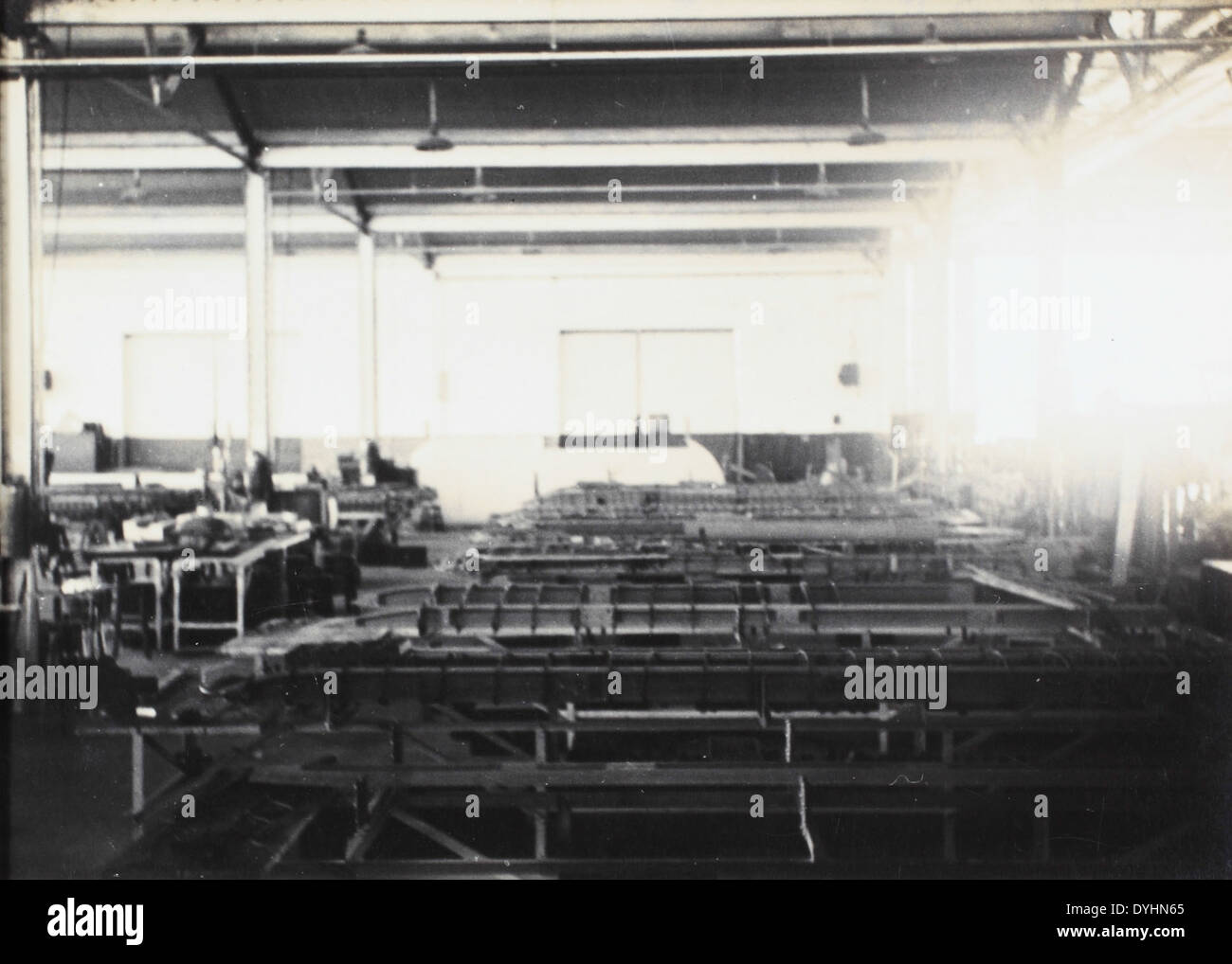 Workers manufacturing facility during hi-res stock photography and ...