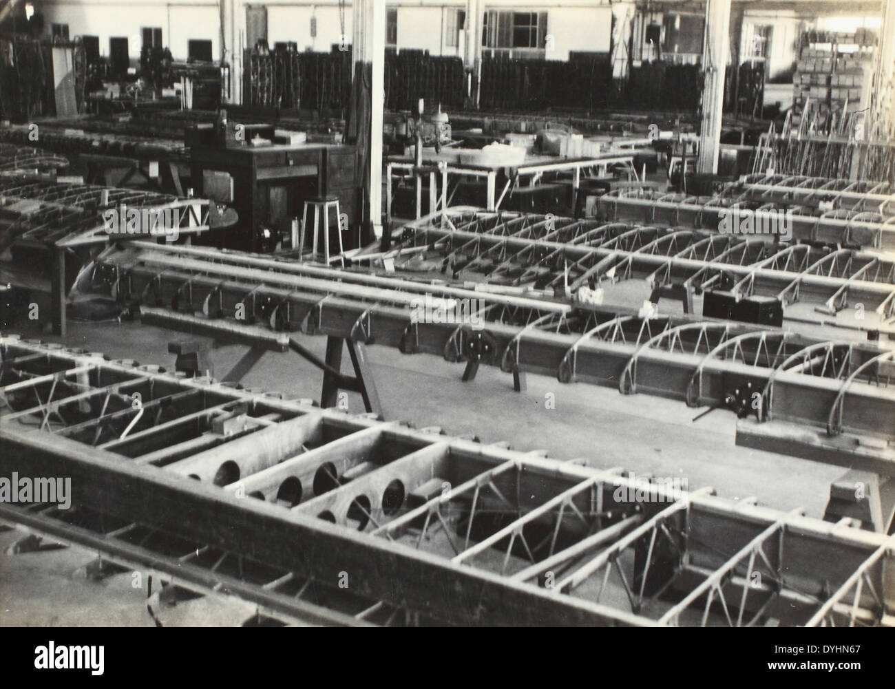 The factory interior image shows the production floor of an aviation or ...