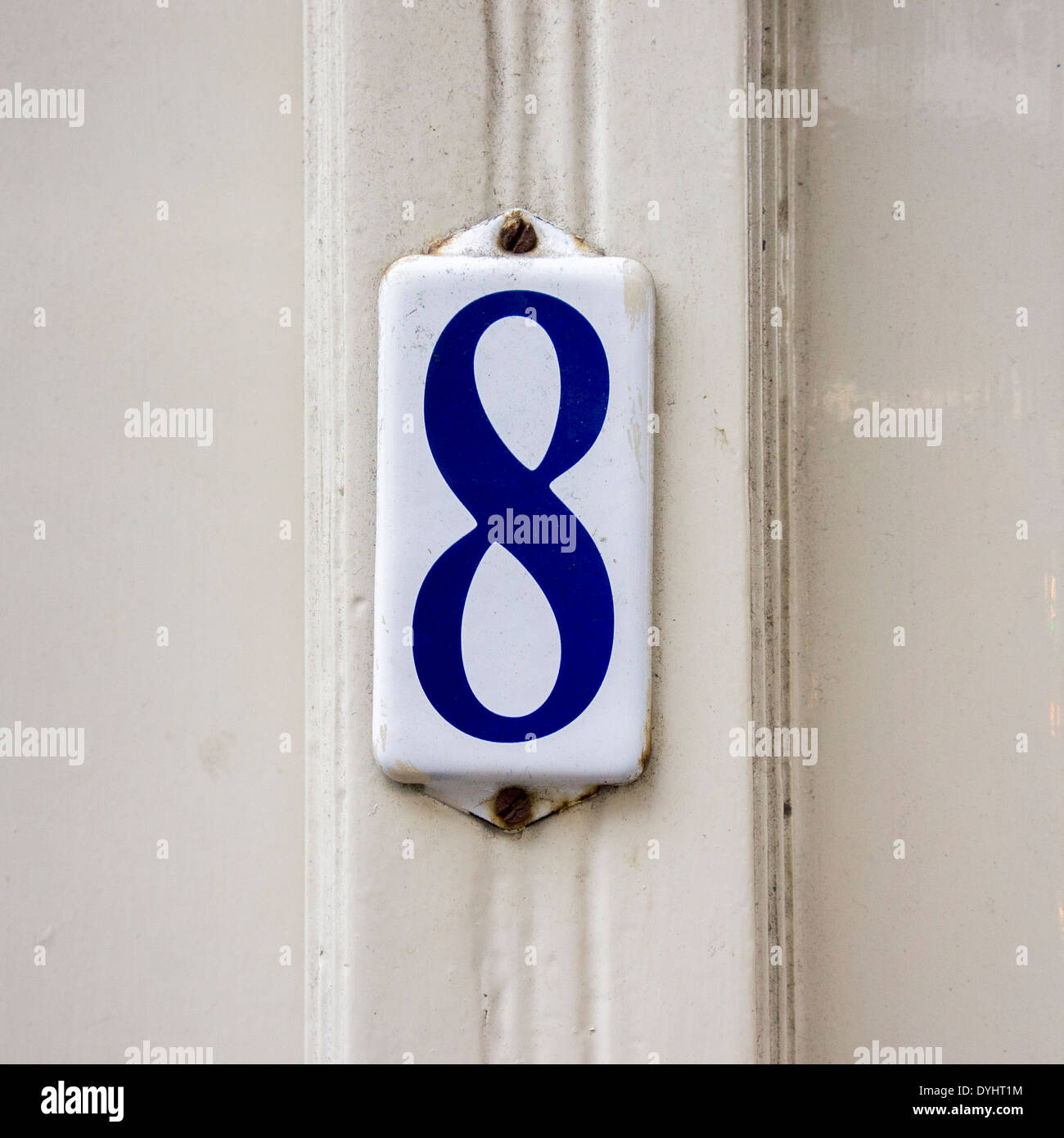 enameled house number eight. Blue lettering on a white background Stock ...
