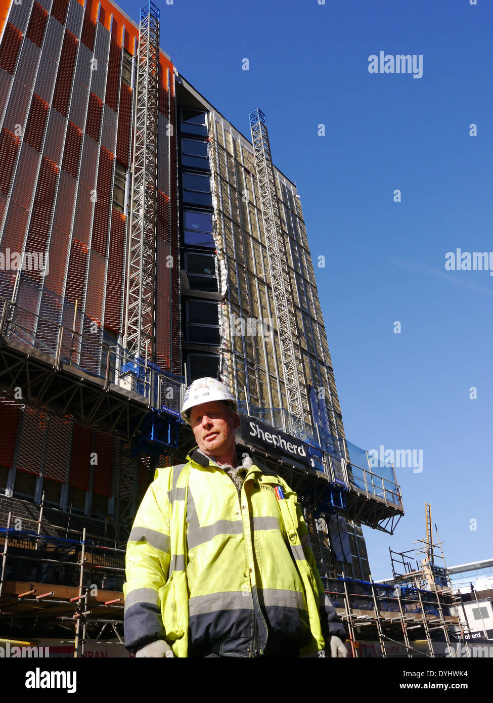 Modern architecture - Construction worker and new office building ...