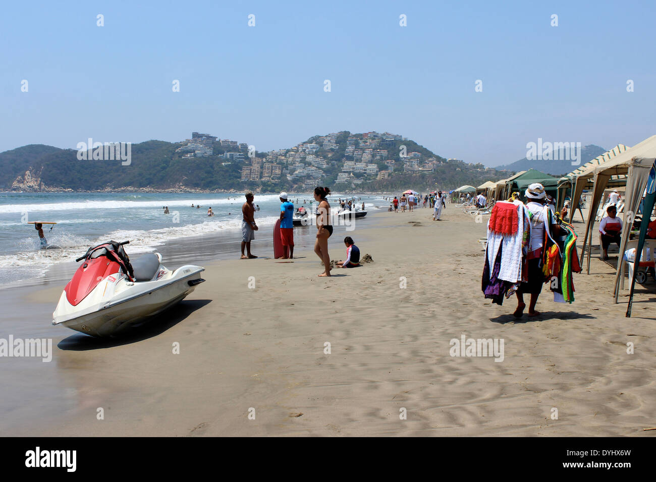 Jet-ski and people on the beach at Playa Revolcadero, Acapulco, Mexico ...