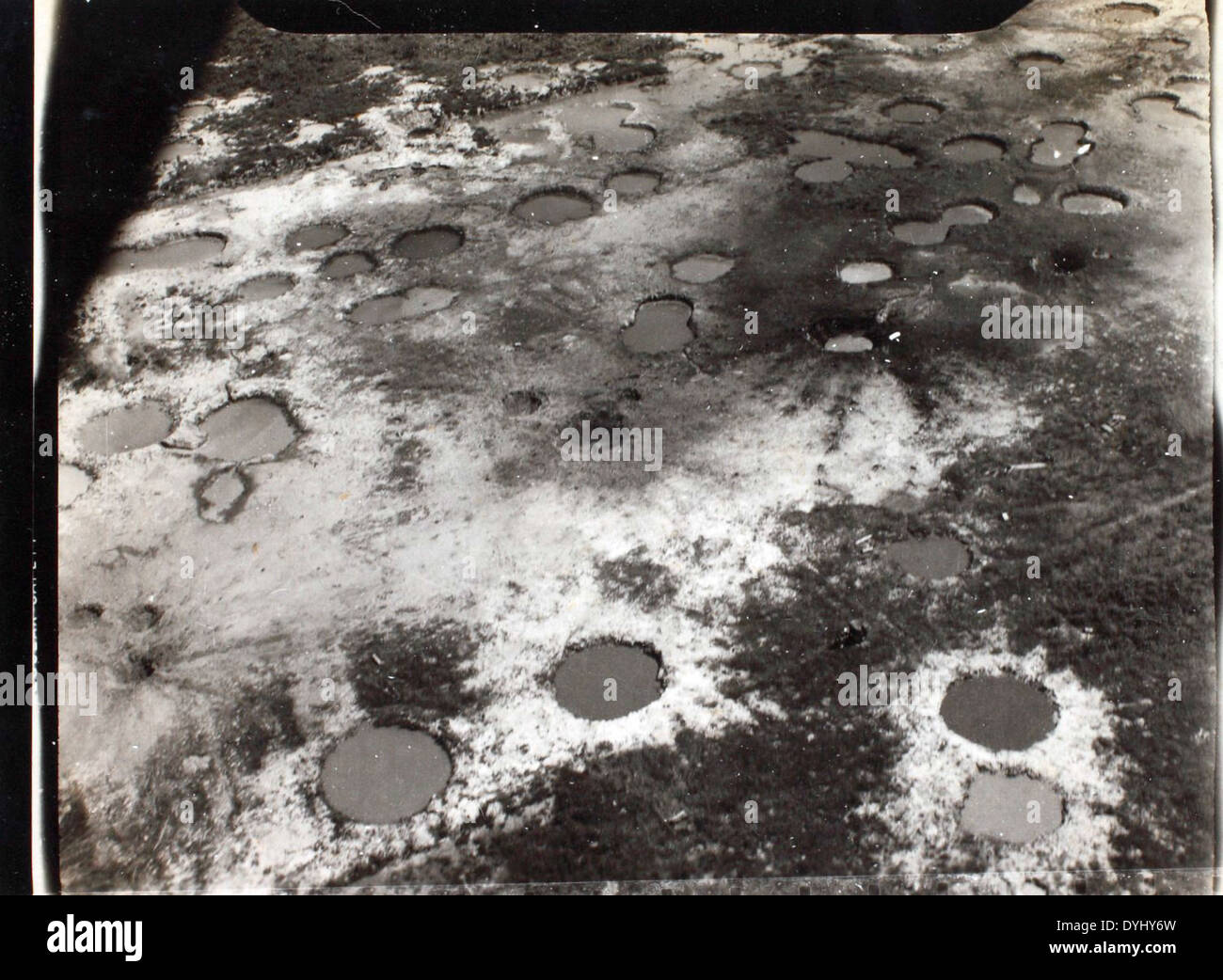 This photograph shows bomb craters created by the Consolidated PB4Y ...