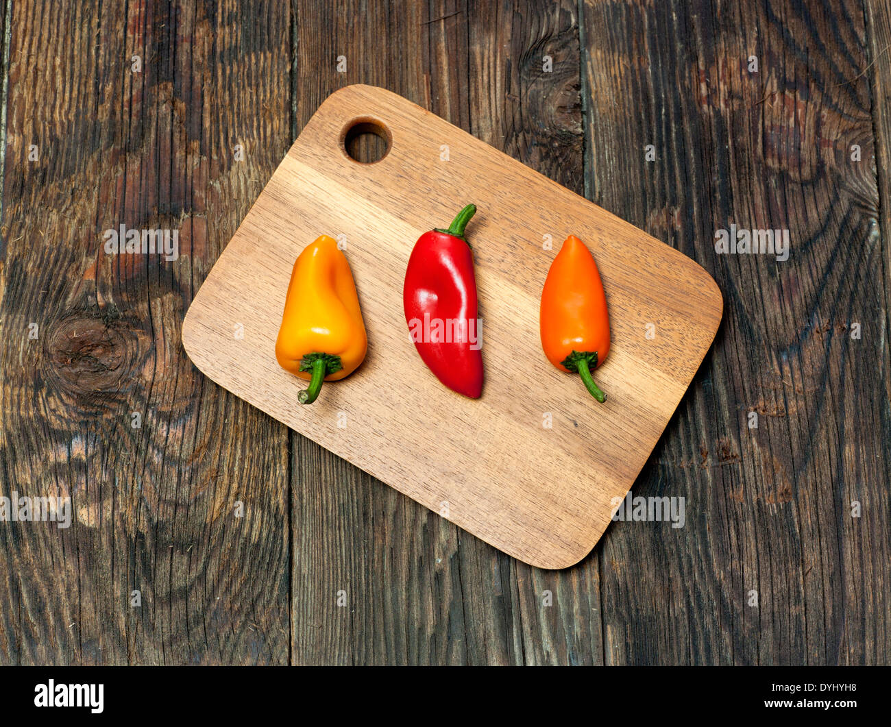 Three peppers on display Stock Photo - Alamy