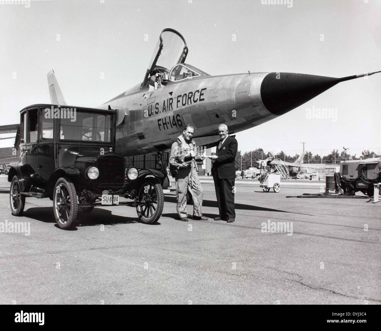 Lin Hendrix stands next to the Republic F-105, a fighter-bomber ...