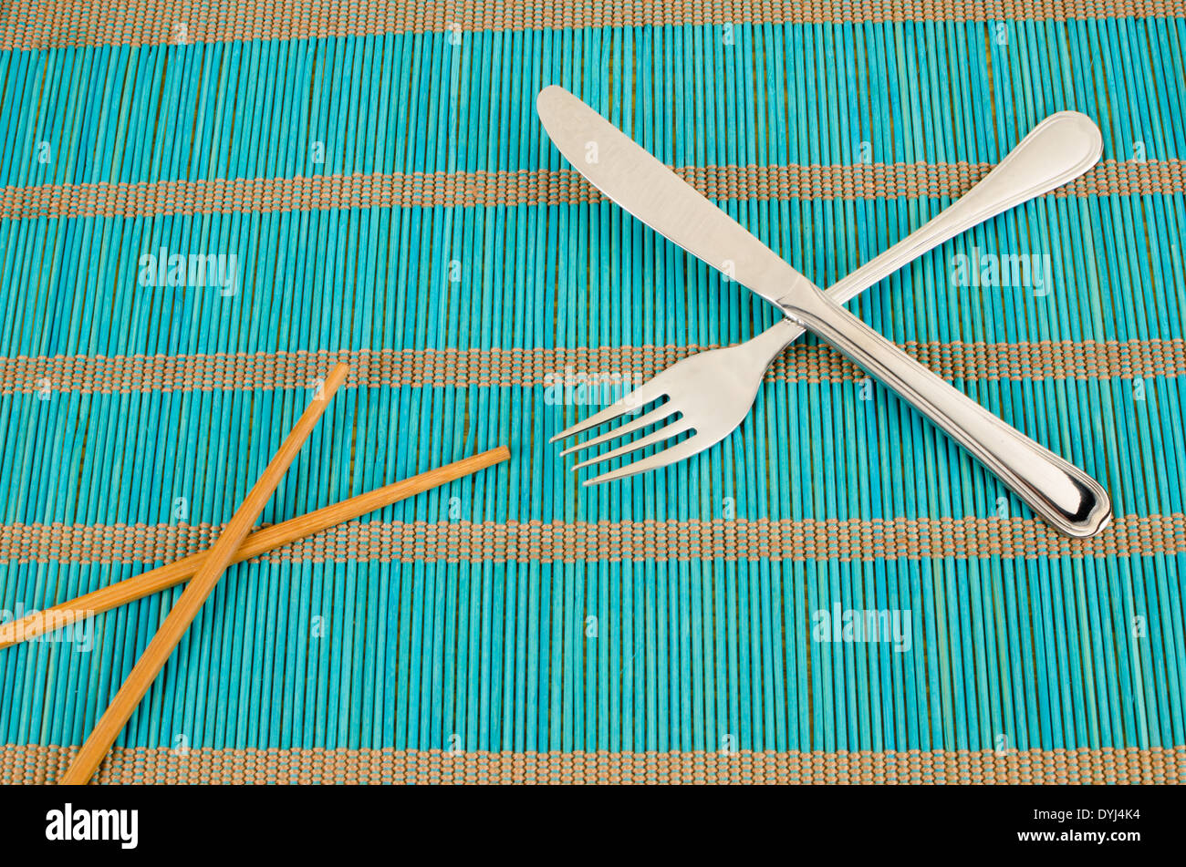 Chopsticks or fork, a still life with a cultural concept Stock Photo ...