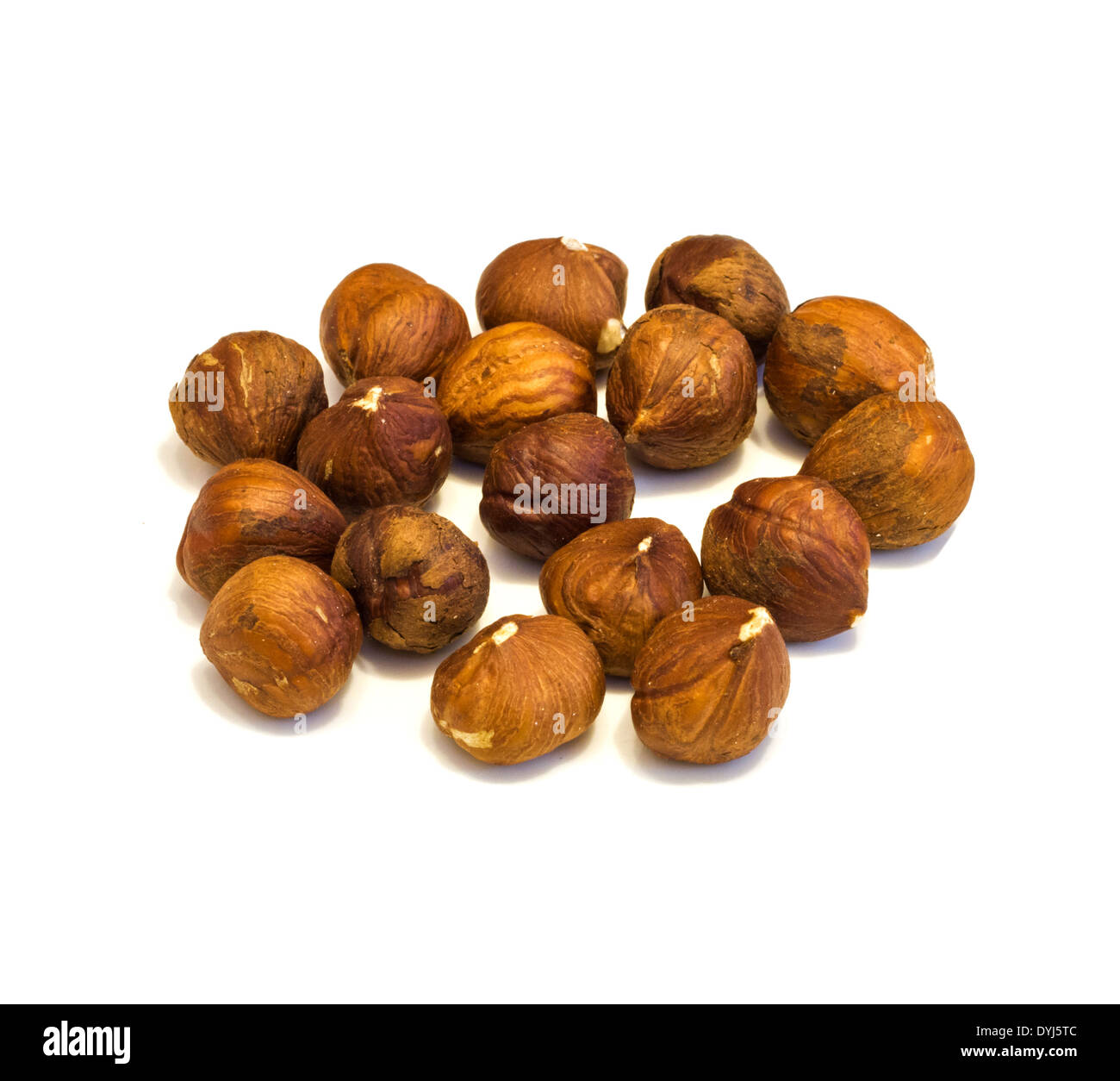 Heap of hazelnuts isolated on white background, macro image Stock Photo ...