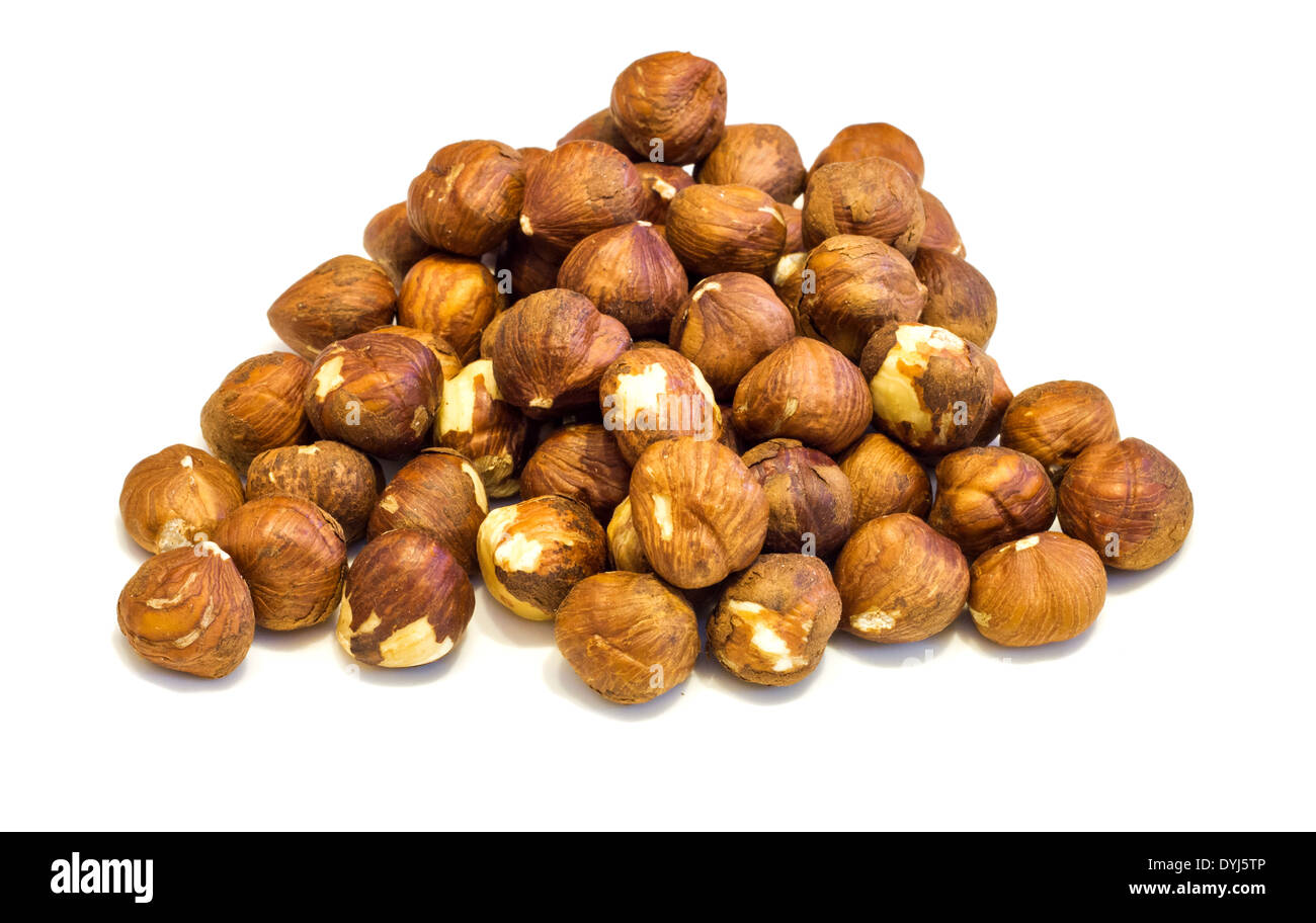 Heap of hazelnuts isolated on white background, macro image Stock Photo ...