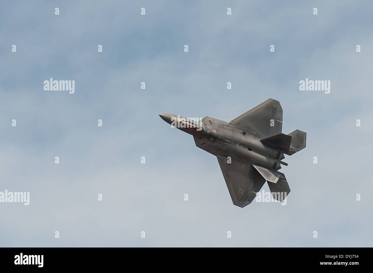 A US Air Force F-22 Raptor stealth fighter aircraft practices an aerial ...