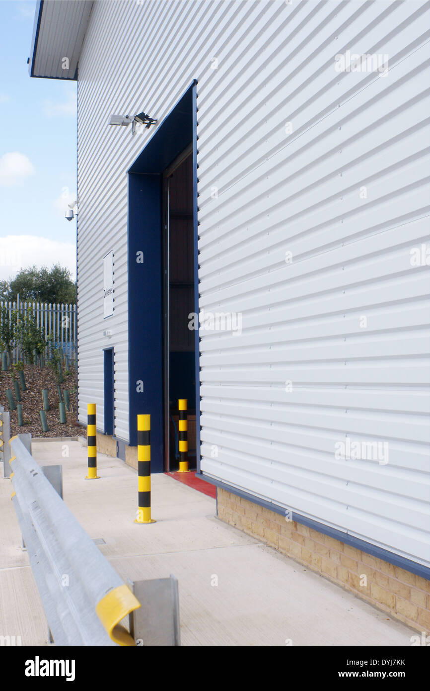 Safety barriers around a loading bay entrance in a warehouse or ...