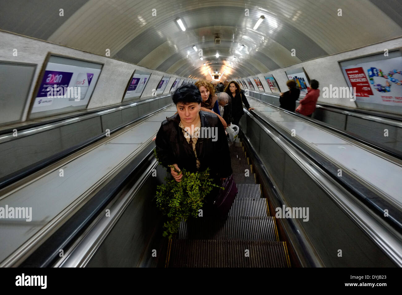 Commuters in the stairway of the underground metro in Tbilisi capital ...
