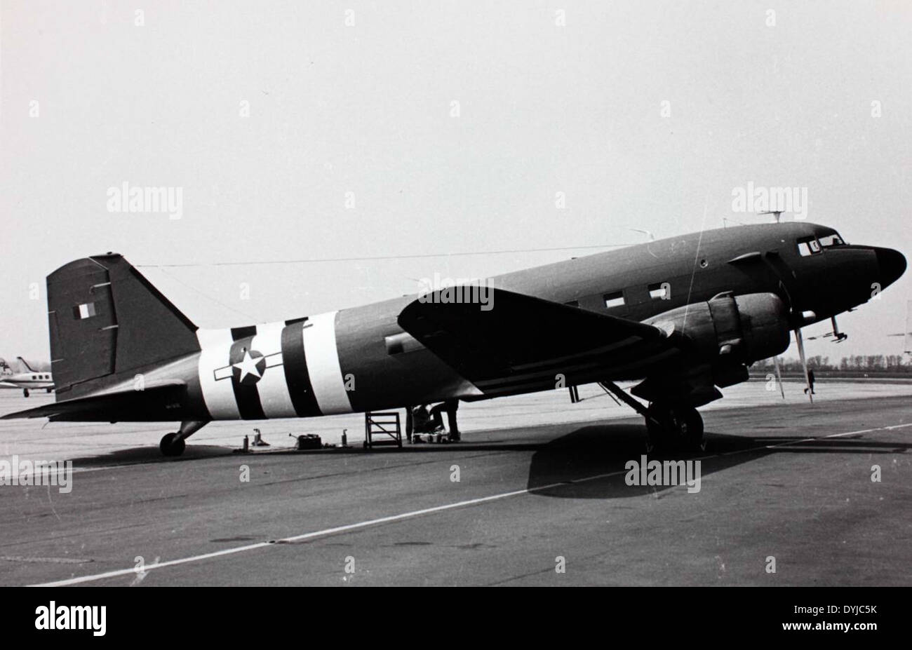 The Douglas DC-3, a twin-engine propeller-driven airliner, and its ...