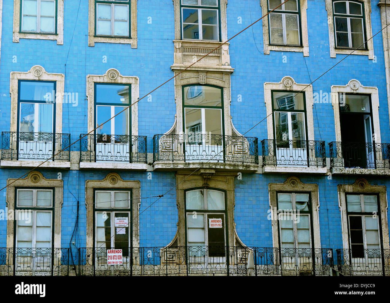Traditional blue tiled residential building with apartments for sale ...