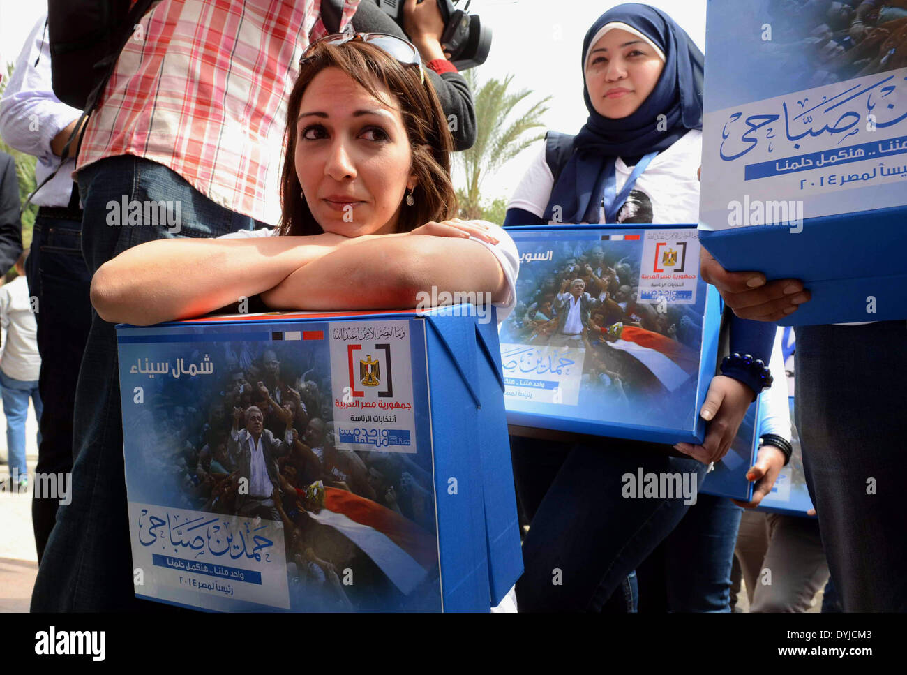 Cairo, Egypt. 19th Apr, 2014. Campaign volunteers of presidential ...